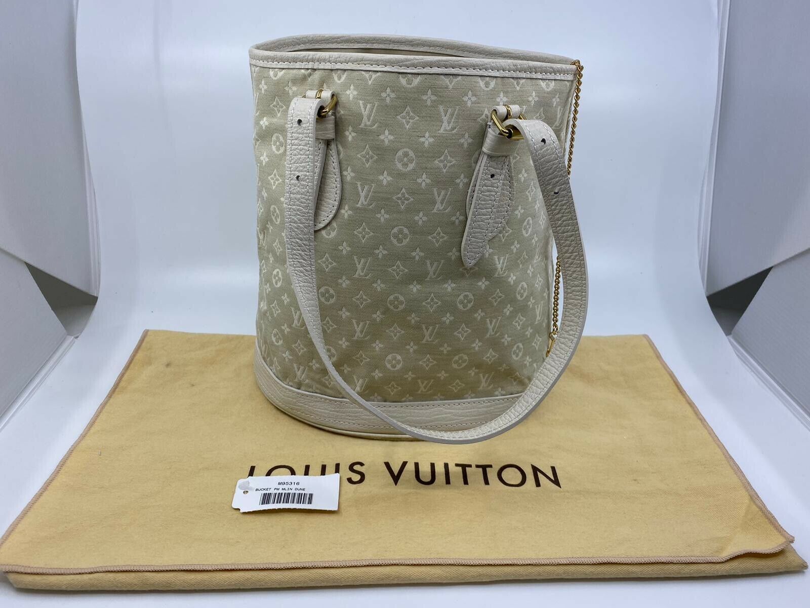 Louis Vuitton Women's Dune Monogram Mini Lin Bucket PM Bag – Luxuria & Co.