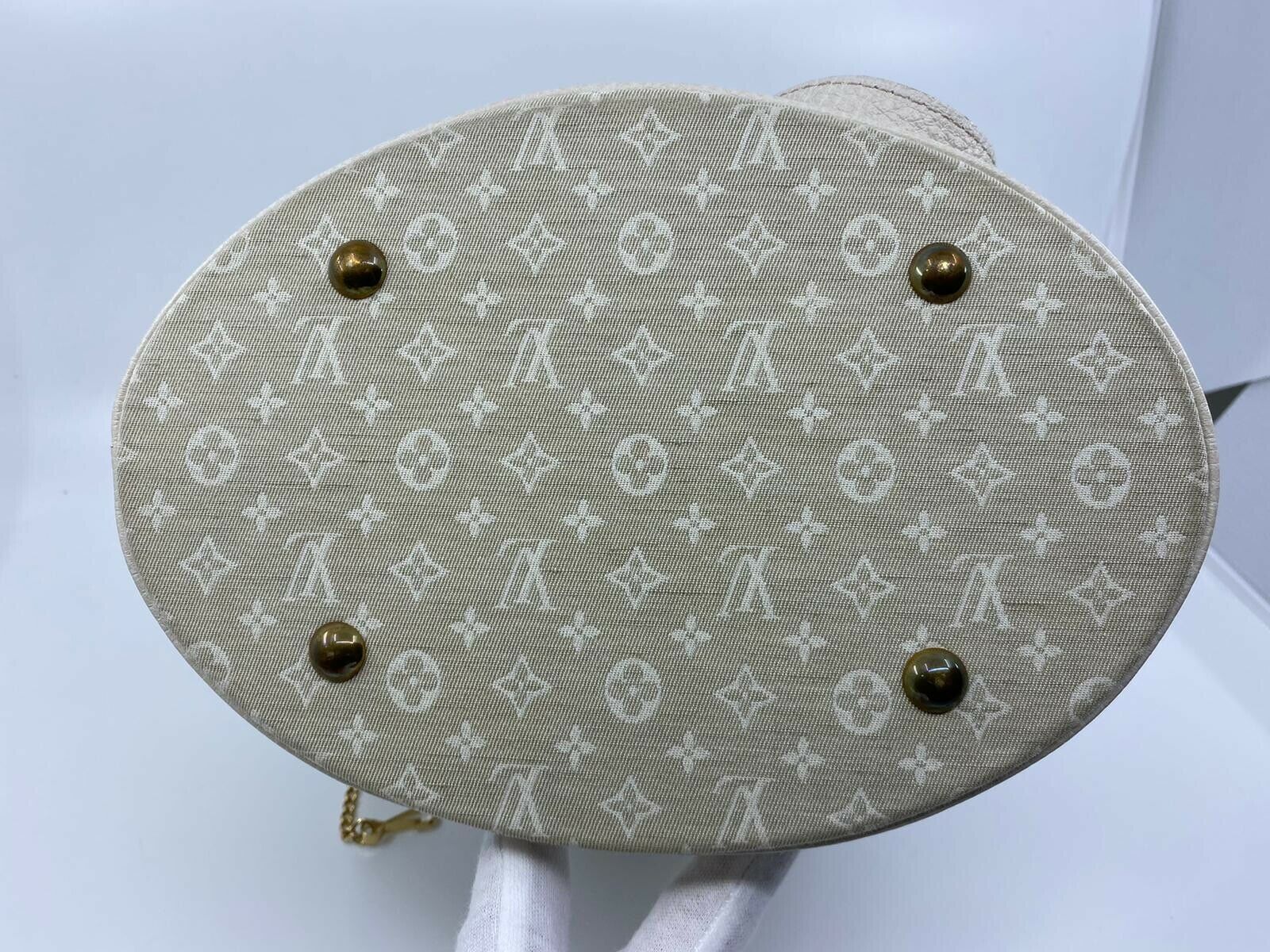 Louis Vuitton Women's Dune Monogram Mini Lin Bucket PM Bag – Luxuria & Co.